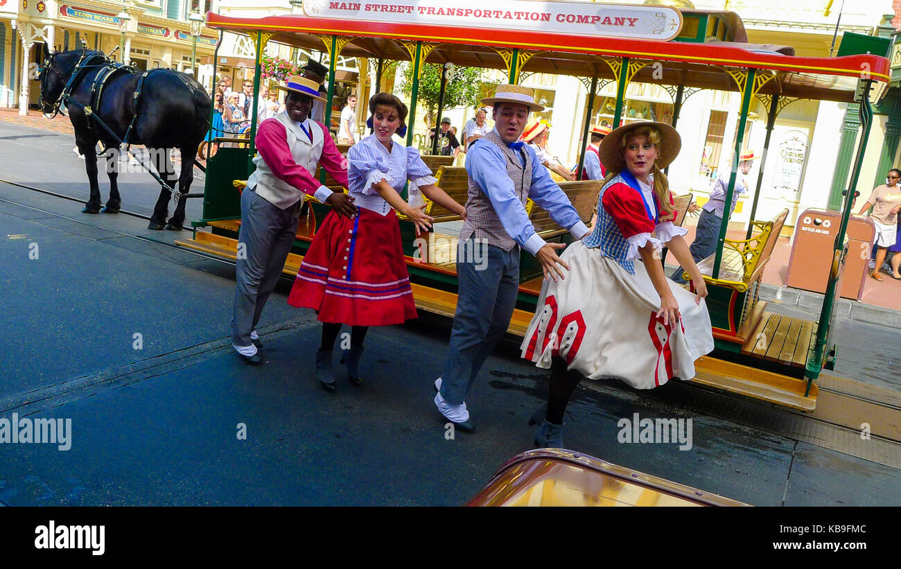 Dancers performing on the main street in Magic Kingdom, Disney World ...