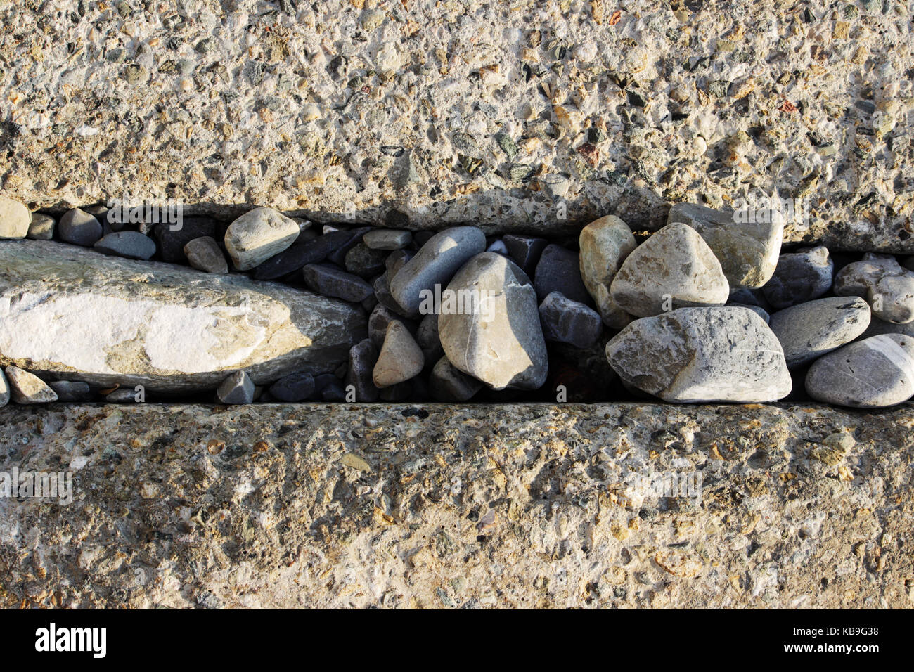 Large concrete rectangular blocks to protect the shore from erosion ...