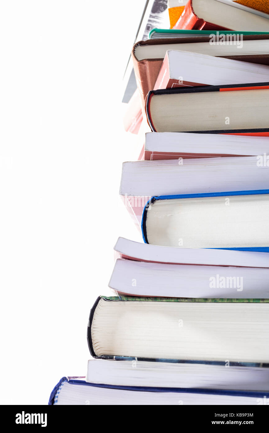 stack of study books of different cover colors Stock Photo - Alamy
