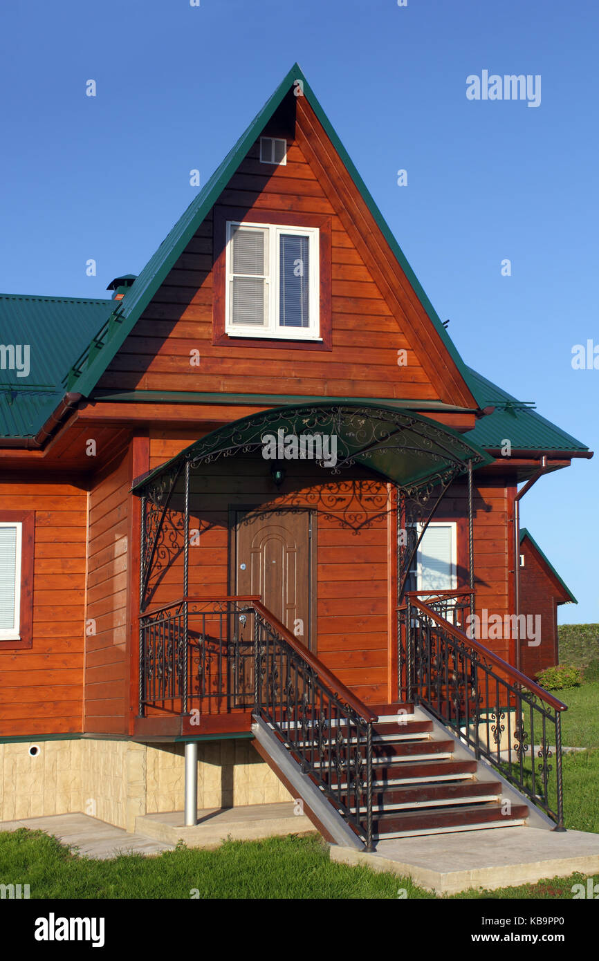 Wooden house front steps left view photo Stock Photo - Alamy