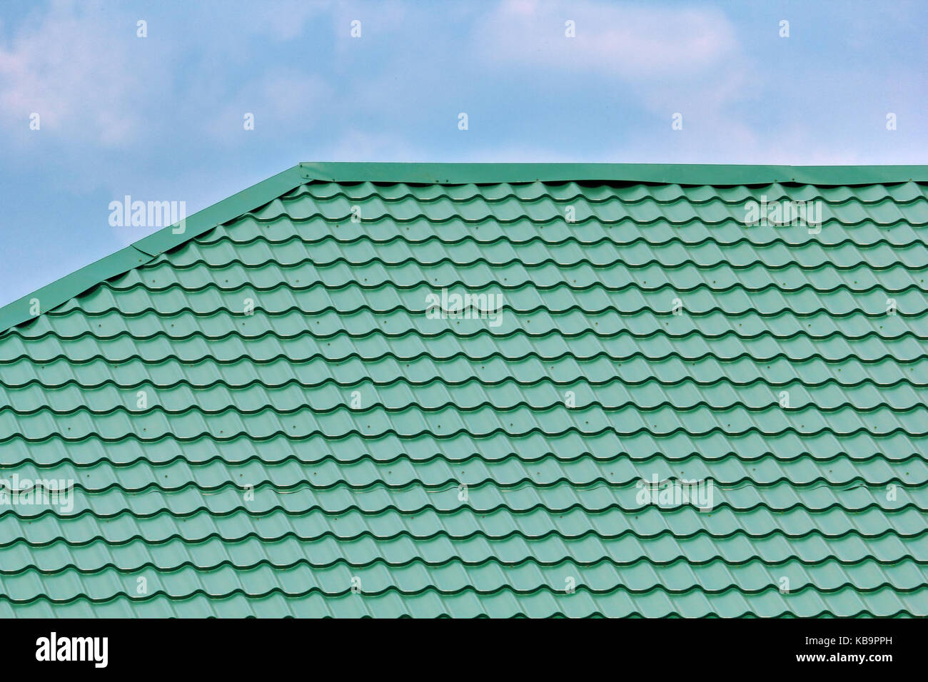 Blue metal tile roof hi-res stock photography and images - Alamy