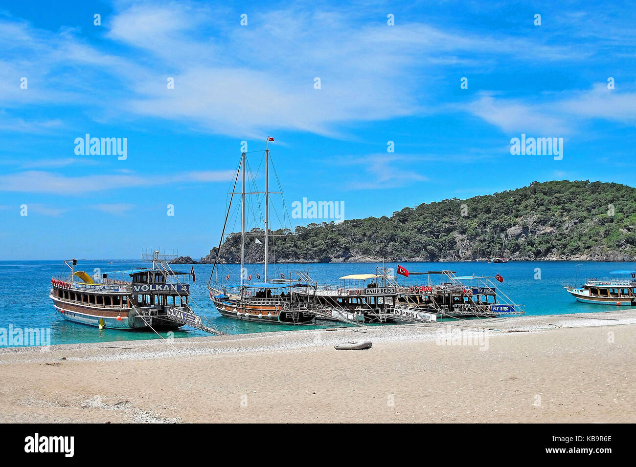tourist boats moored at Olu Deniz Belcekiz Beach, Turkey Stock Photo ...