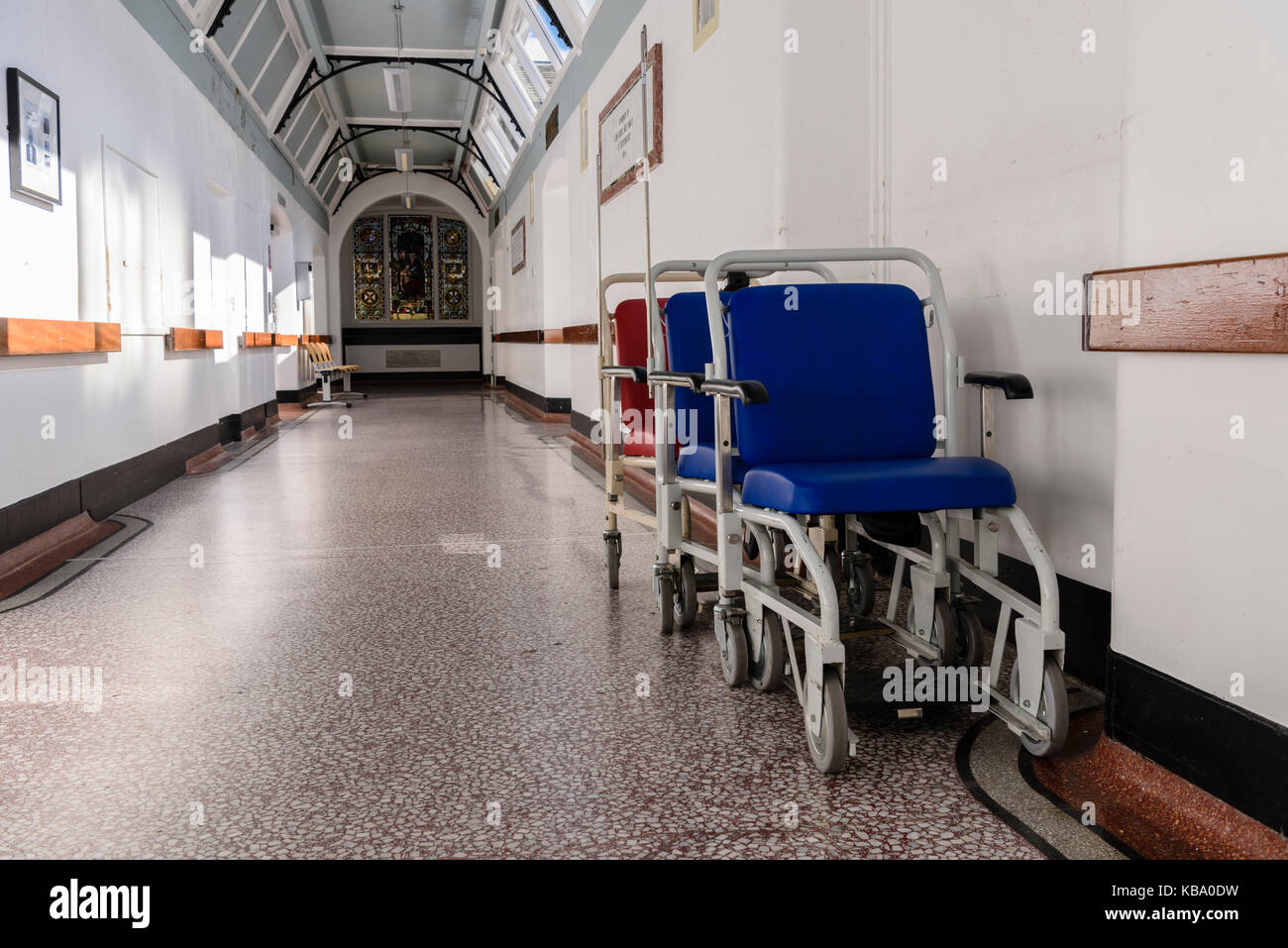 Wheelchairs parked in a hospital corridor Stock Photo - Alamy