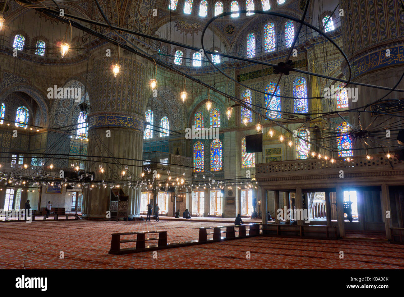 Interior view, featuring the prayer area and stained glass windows, of ...