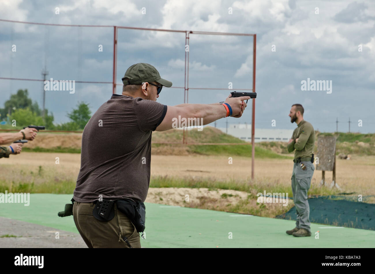 Shooting range pistol man hi-res stock photography and images - Alamy