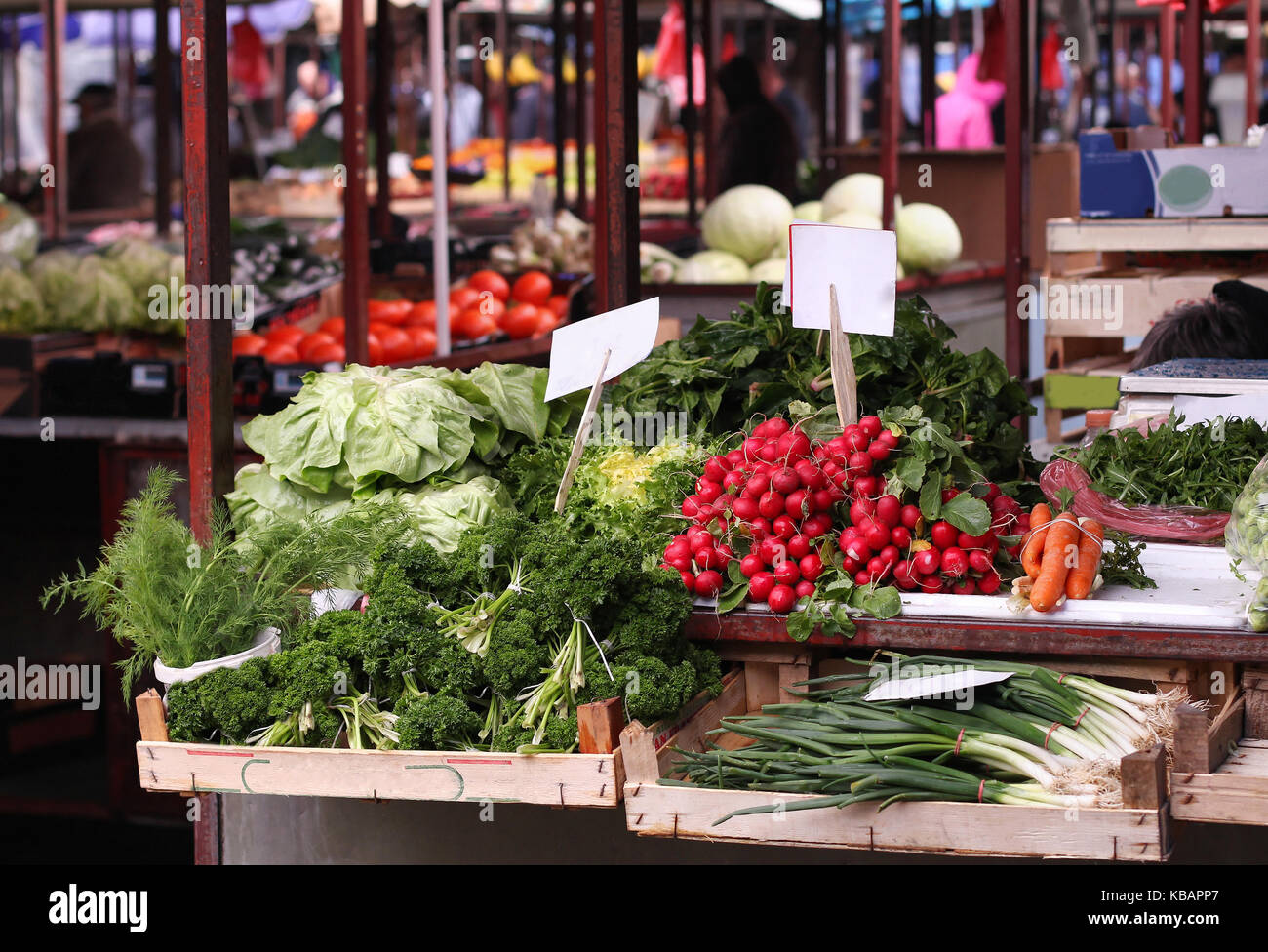 Fresh organic vegetables in wooden crates on market stall Stock Photo ...