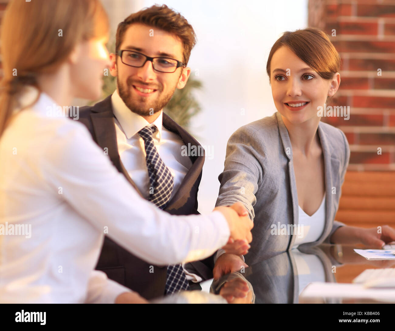 business woman greets the employee with a handshake Stock Photo - Alamy