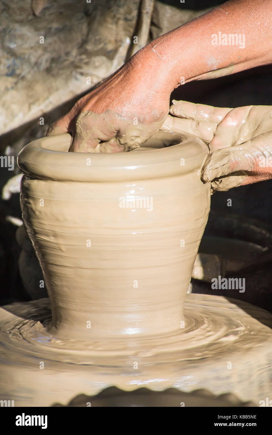 Molding a pot of clay hi-res stock photography and images - Alamy