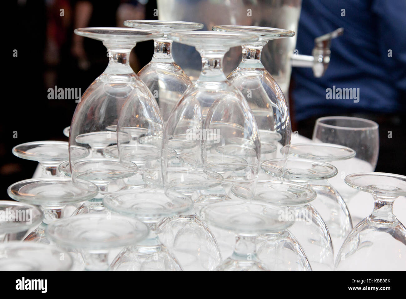 a row of water glasses stacked at a restaurant Stock Photo - Alamy