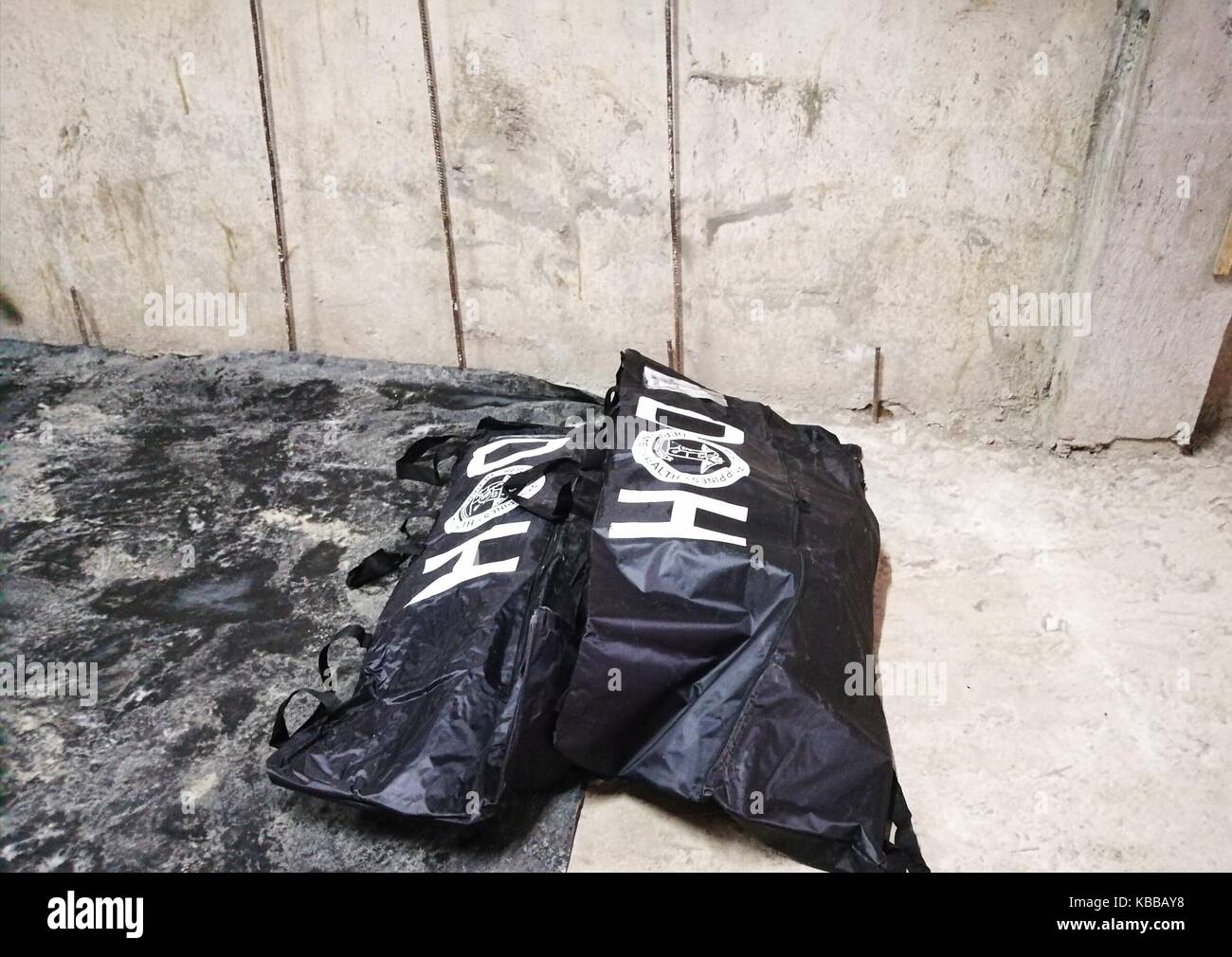 Dead bodies recovered hi-res stock photography and images - Alamy