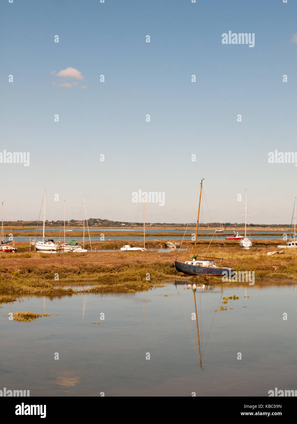 boats parked in stream river estuary in tollesbury maldon essex; essex ...