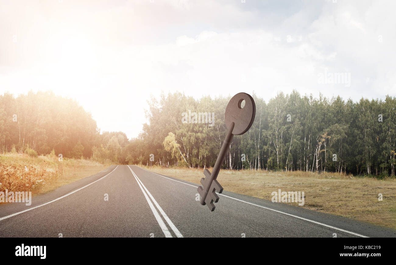 Conceptual background image of concrete key sign on asphalt road Stock ...