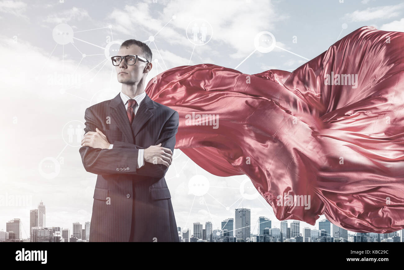 Concept of power and sucess with businessman superhero in big ci Stock ...