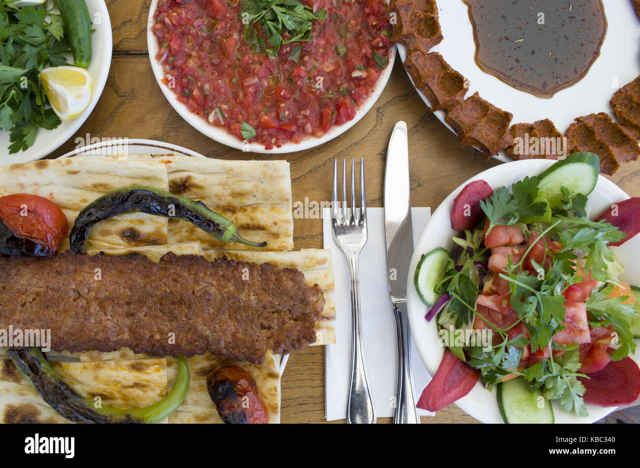plate of Adana Kebab a typical turkish meat dish Stock Photo - Alamy