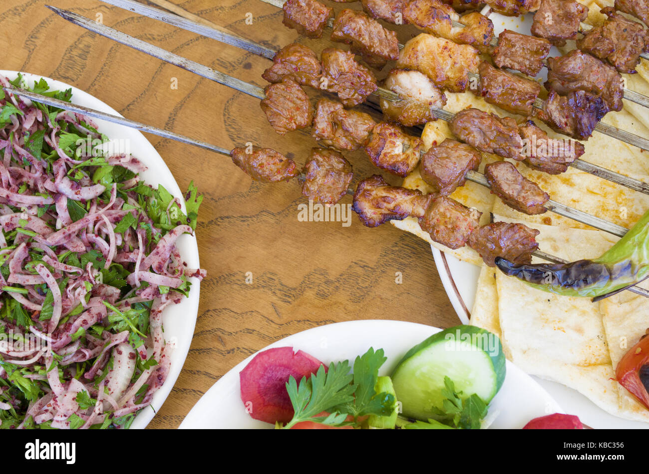 shish kebabs menu and vegetables Stock Photo - Alamy