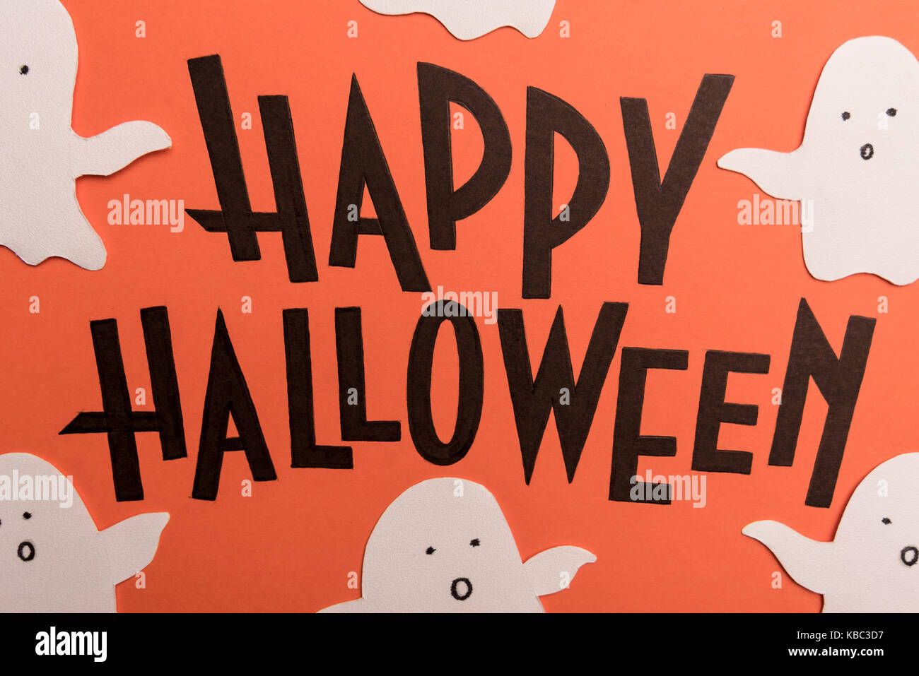 Black typeface phrase for halloween logo with ghosts handwritten on ...