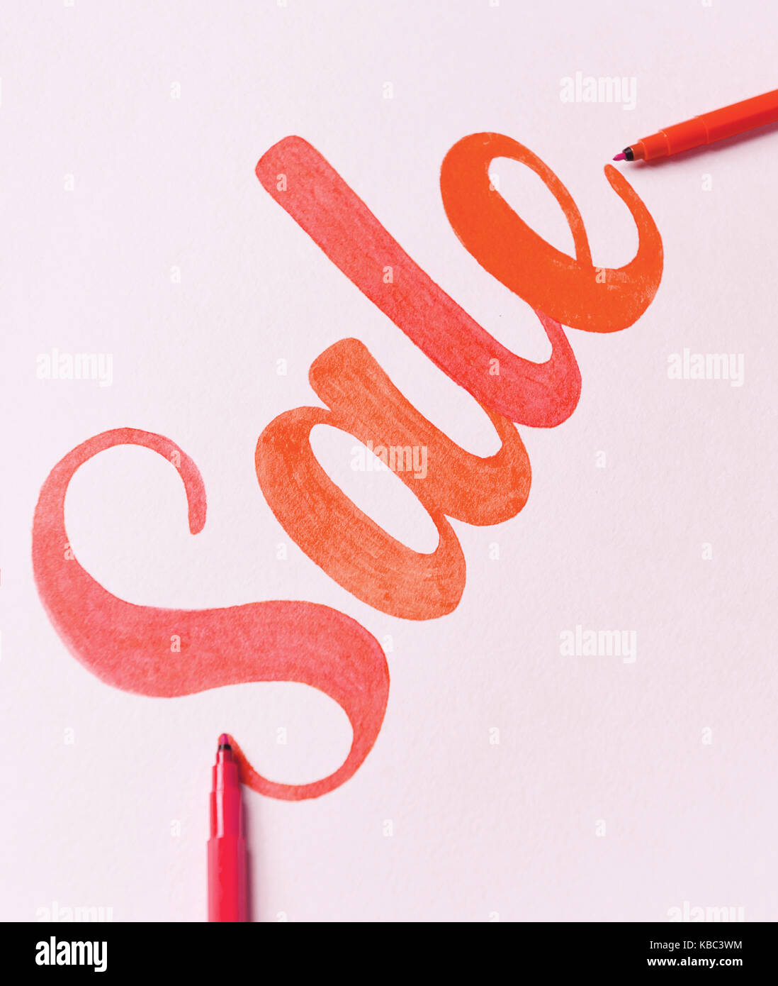 Painted lettering SALE on white background Stock Photo - Alamy