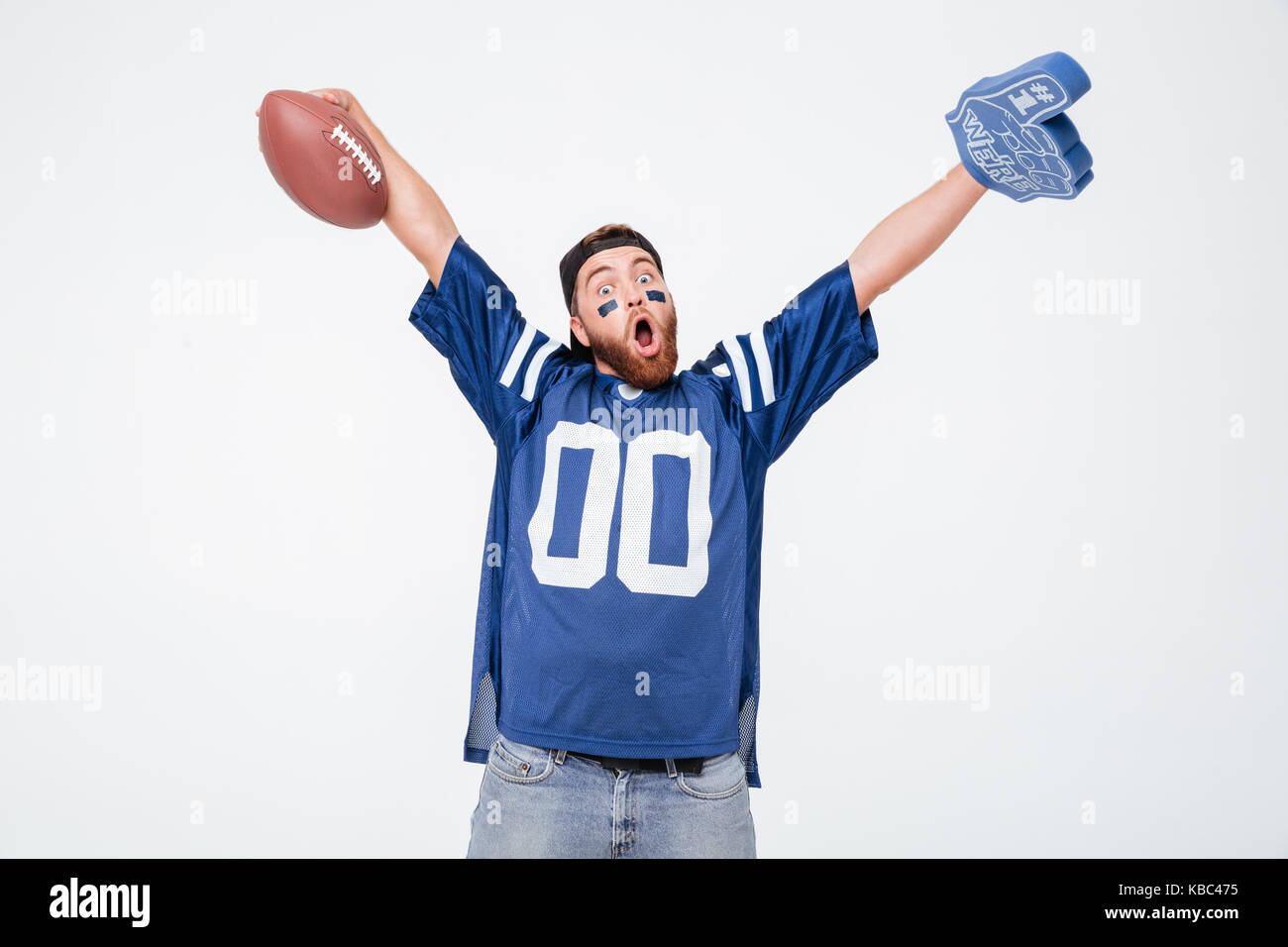 Photo of screaming man fan in blue t-shirt standing isolated over white ...