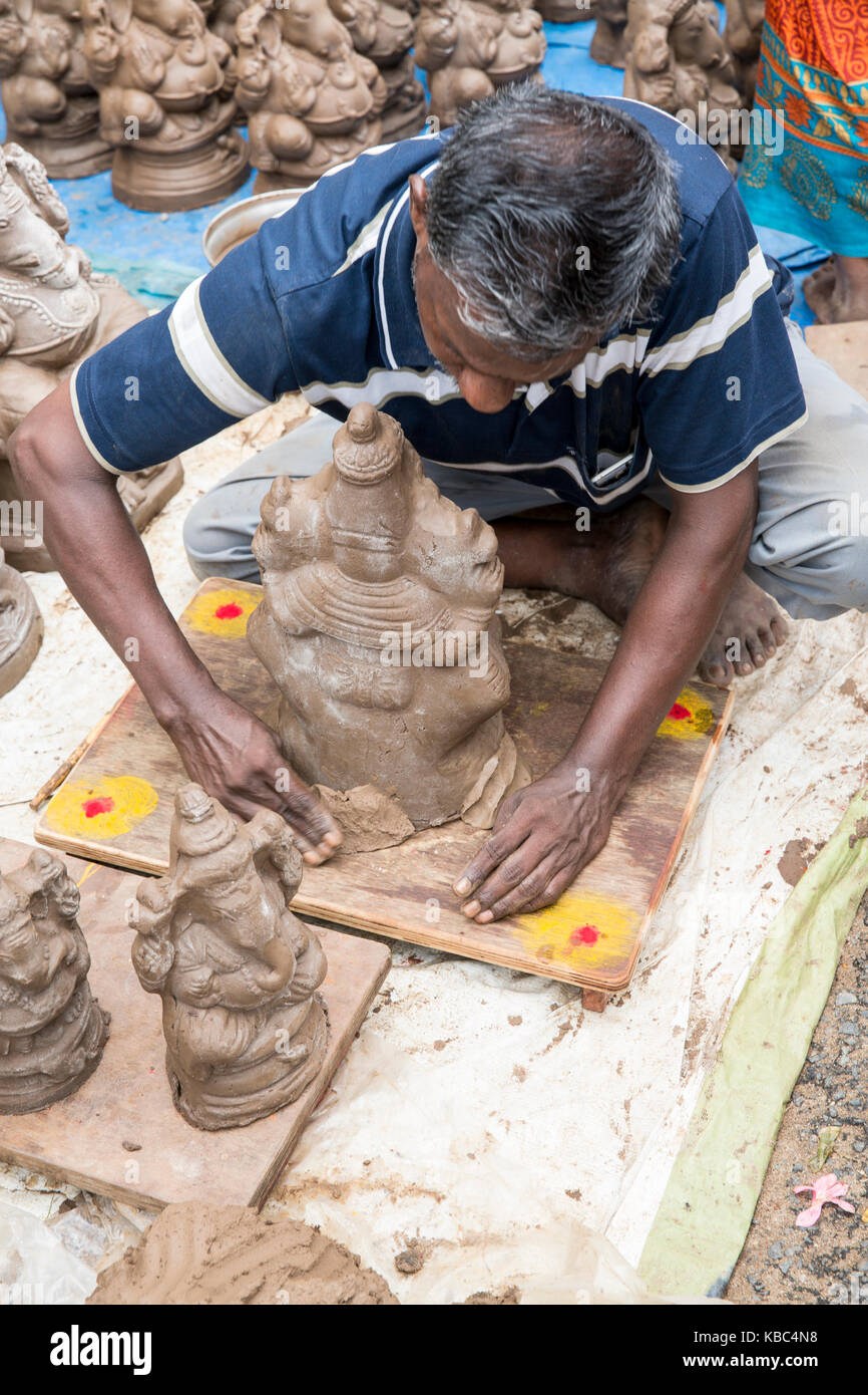 Close up of hand crafted Ganesha idol clay statues displayed in the ...