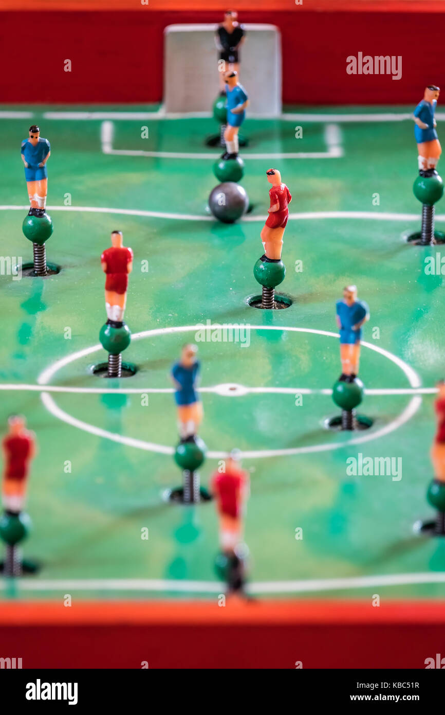 Close-up shot of players figures of a tabletop football game Stock ...
