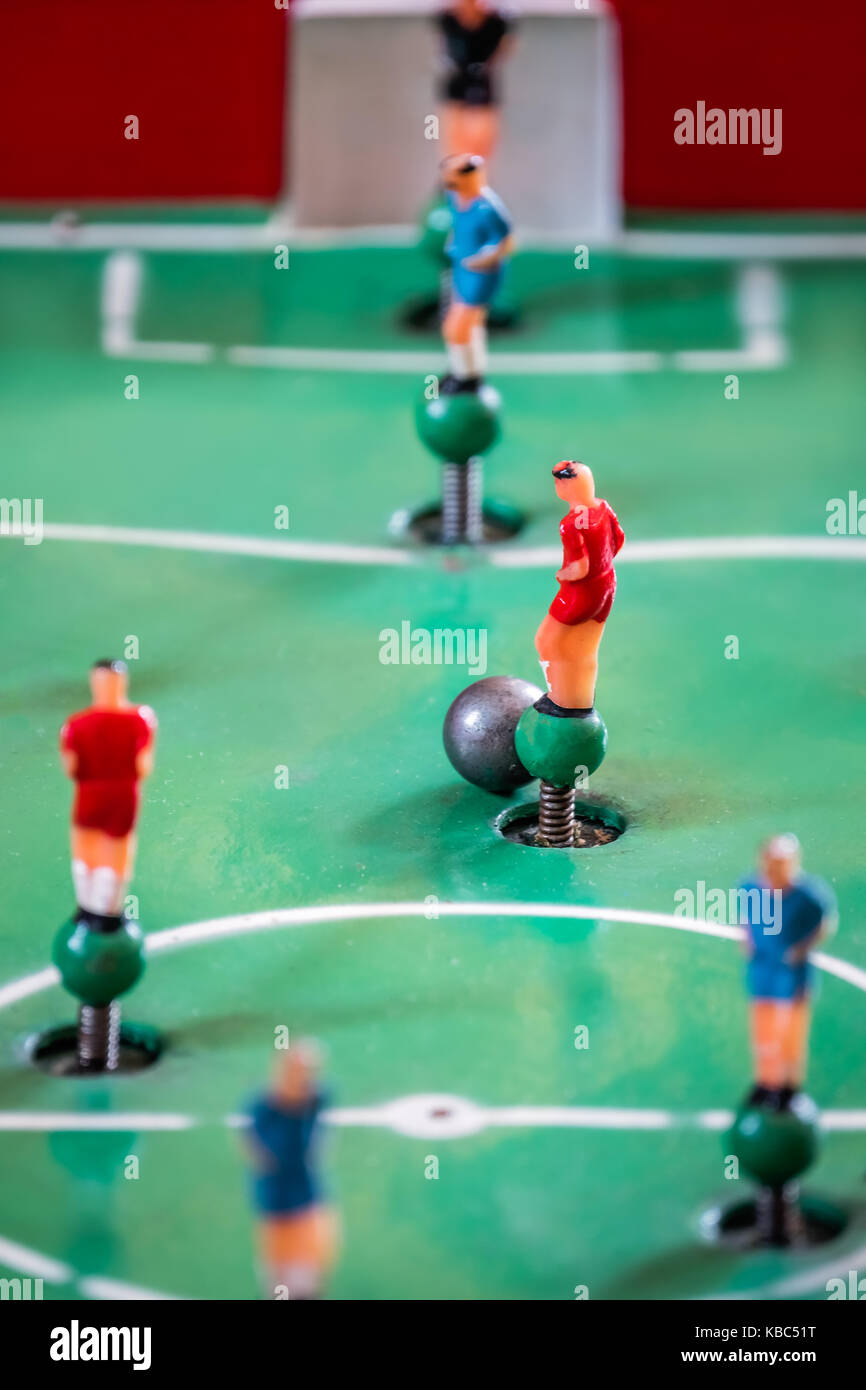 Close-up shot of players figures of a tabletop football game Stock ...