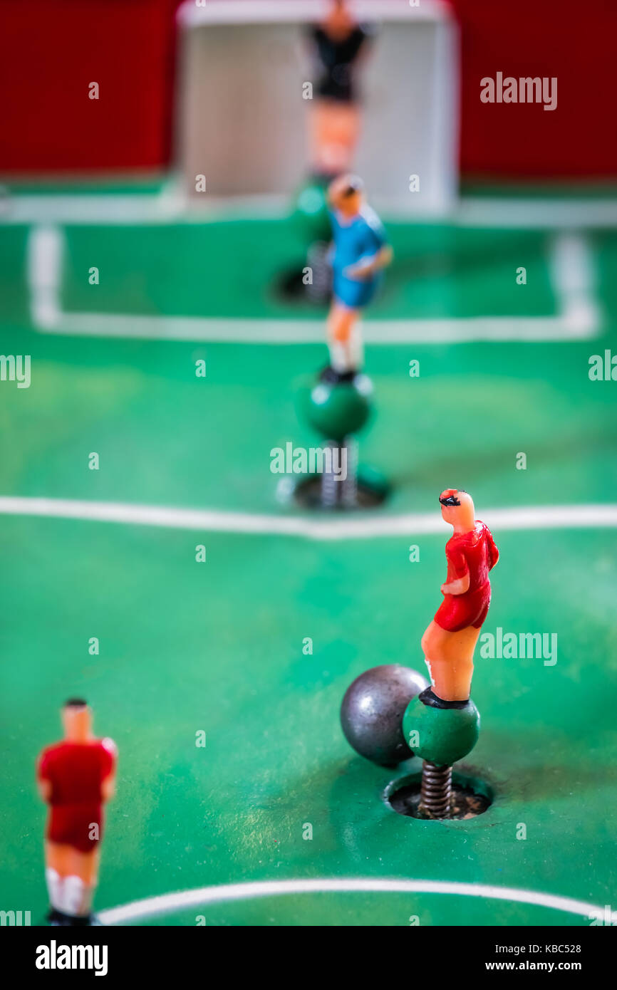 Close-up shot of players figures of a tabletop football game Stock ...