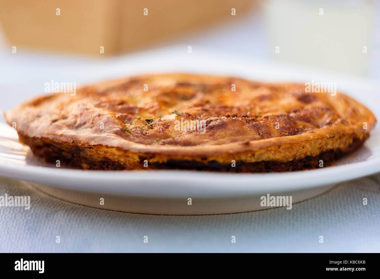 Perfectly Baked Tasty Moussaka Pie On White Plate Stock Photo - Alamy