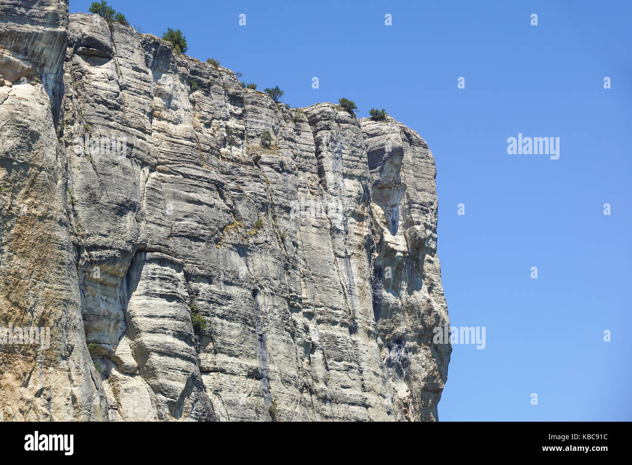 vertical mountain . Rock climbing the steep cliffs of the mountains ...
