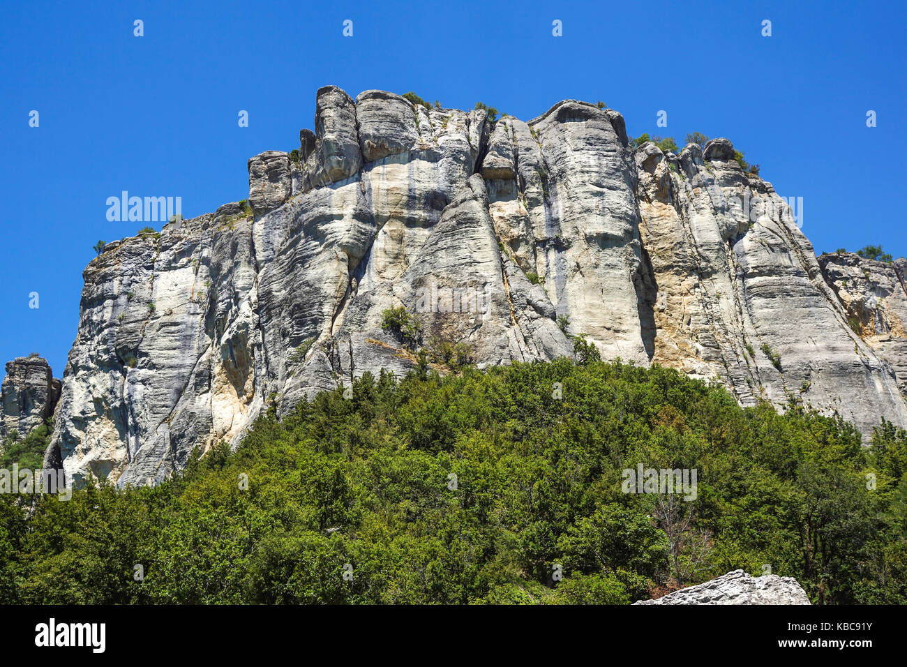 vertical mountain . Rock climbing the steep cliffs of the mountains ...