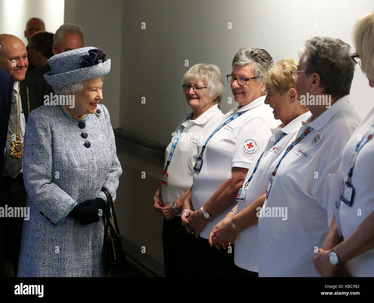 Queen Elizabeth II meets staff during a visit to Aberdeen Royal ...