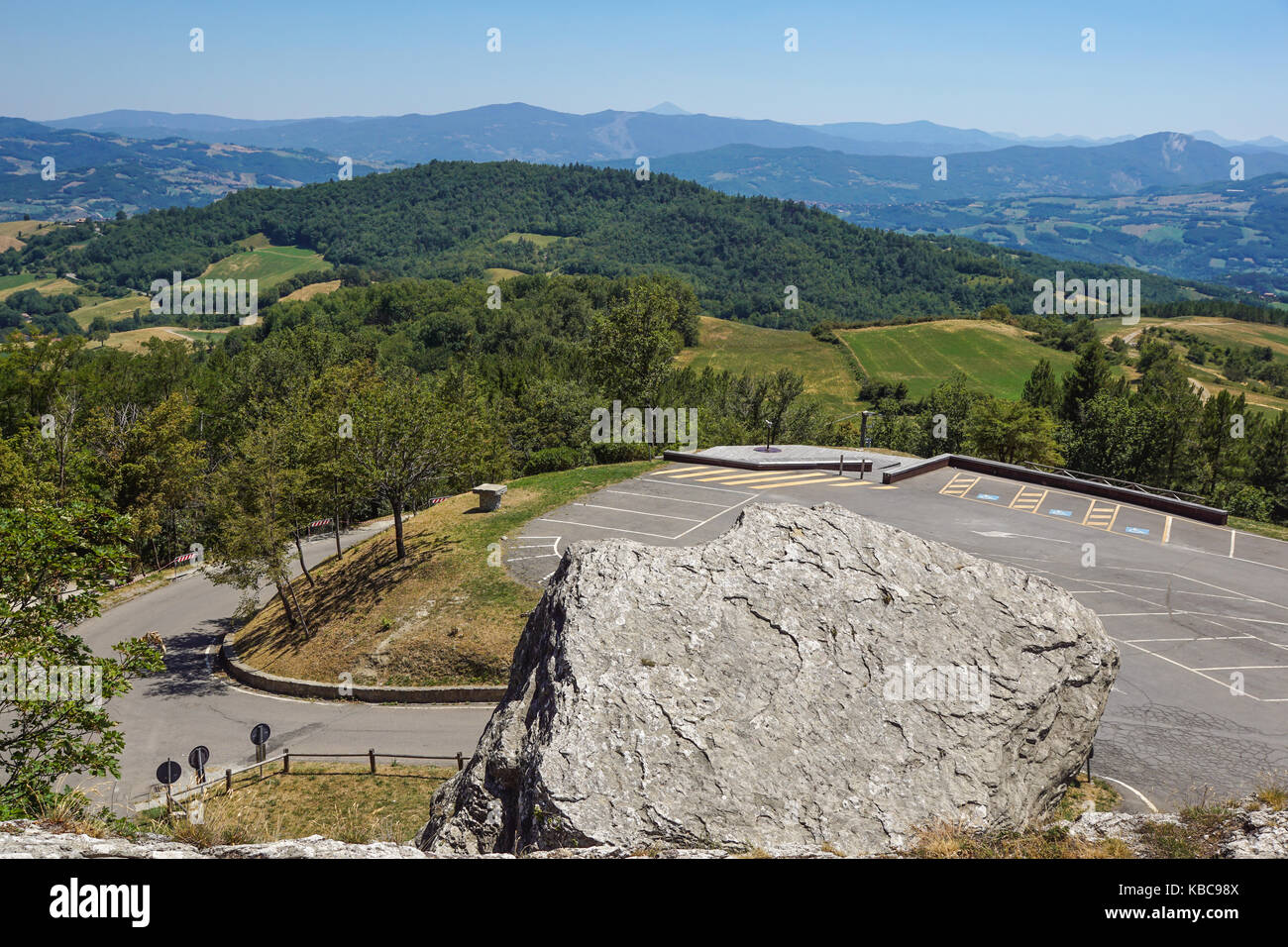 Parking in the valley in the mountains Stock Photo - Alamy