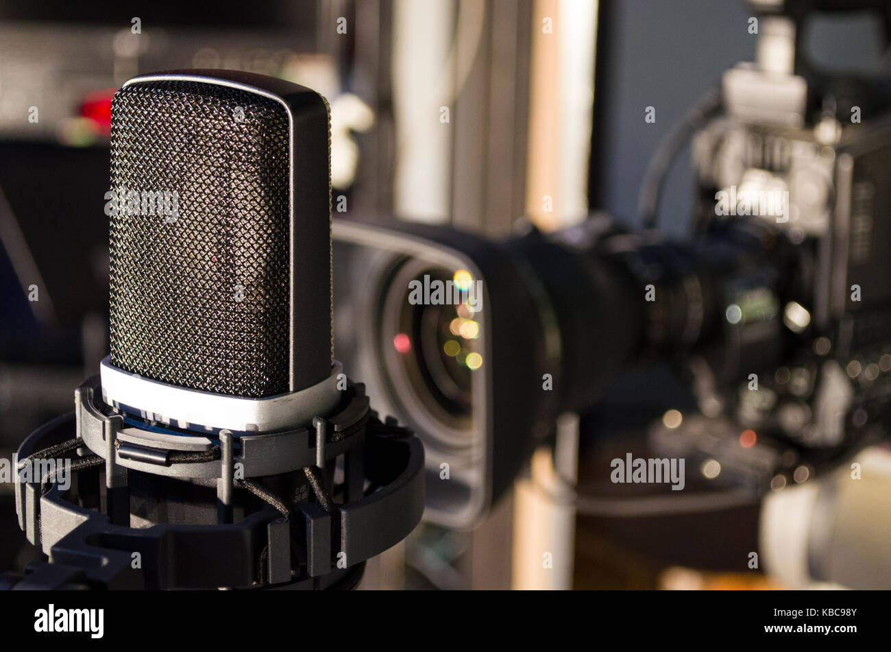 Retro microphone on stage a background of studio camera Stock Photo - Alamy