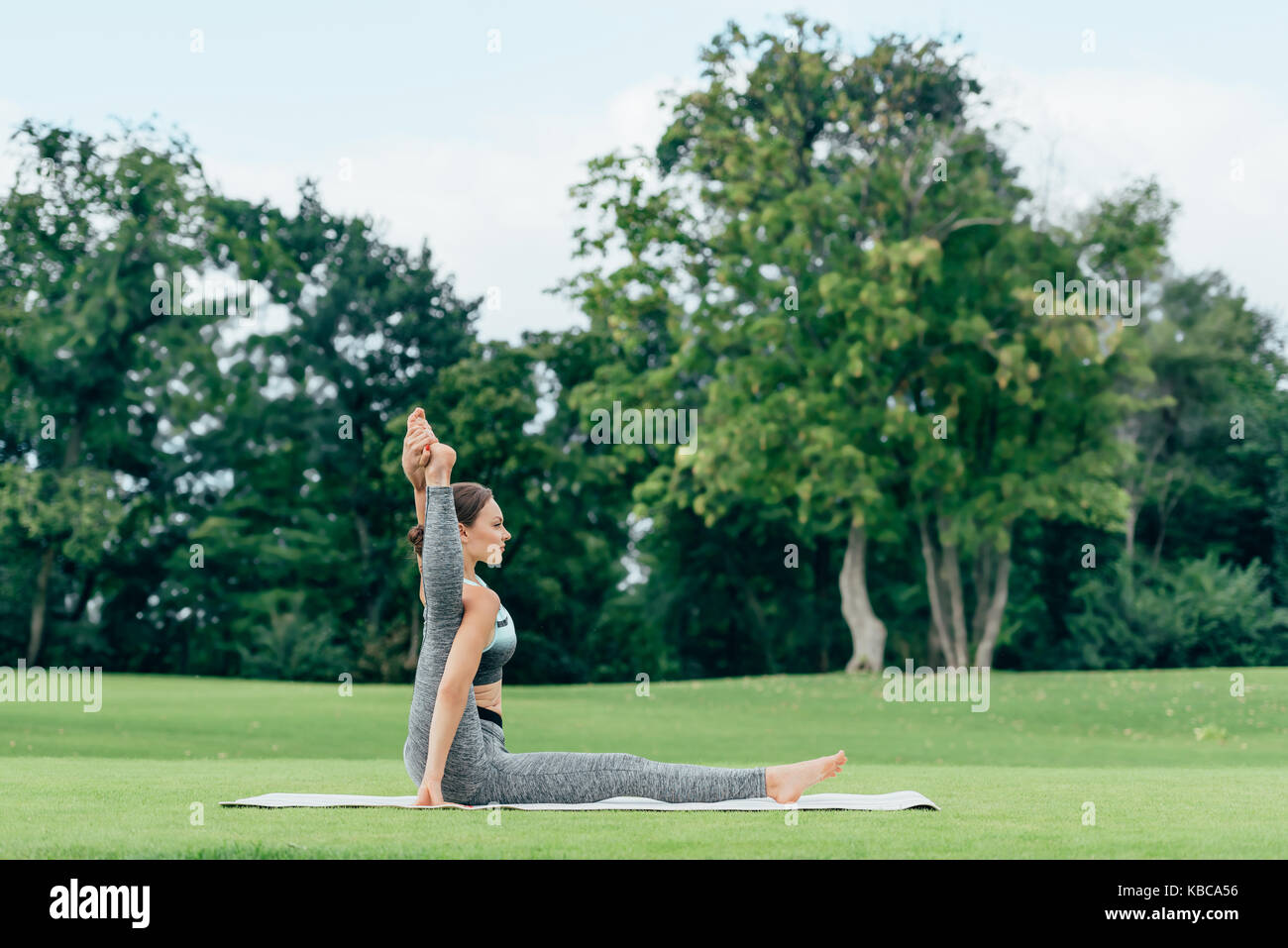 Woman performing seated exercise hi-res stock photography and images ...