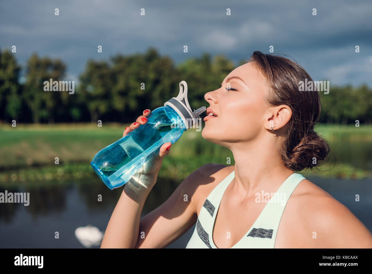 woman with water bottle Stock Photo - Alamy