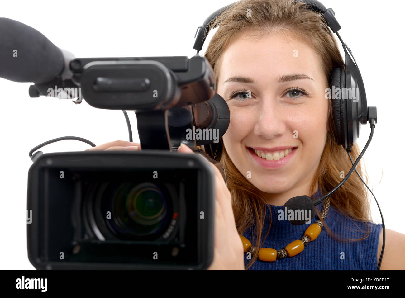 young woman with a video camera, on white background Stock Photo - Alamy