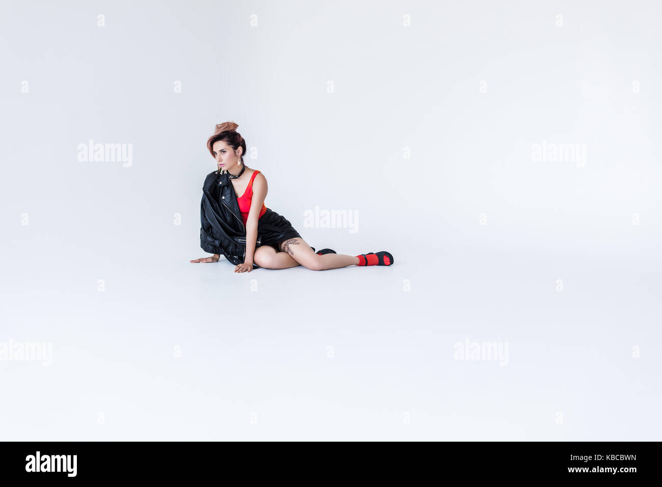 girl posing in leather jacket Stock Photo - Alamy