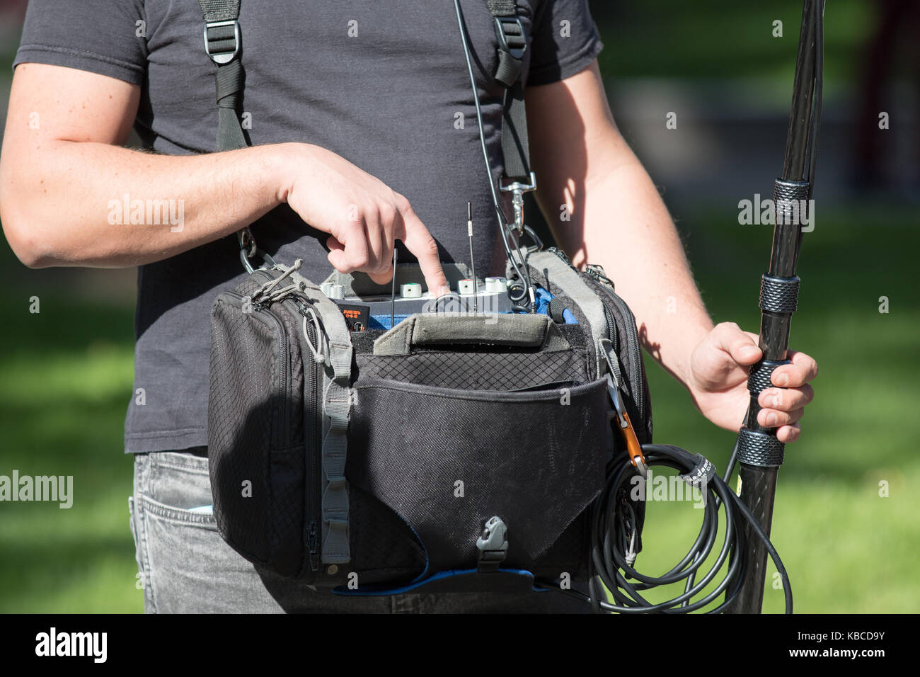 Man microphone street hi-res stock photography and images - Alamy