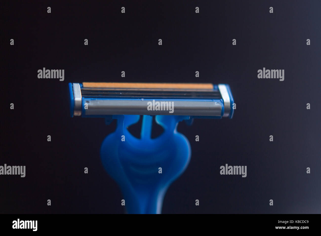 Modern safety disposable plastic shaving razor with multiple blades and ...