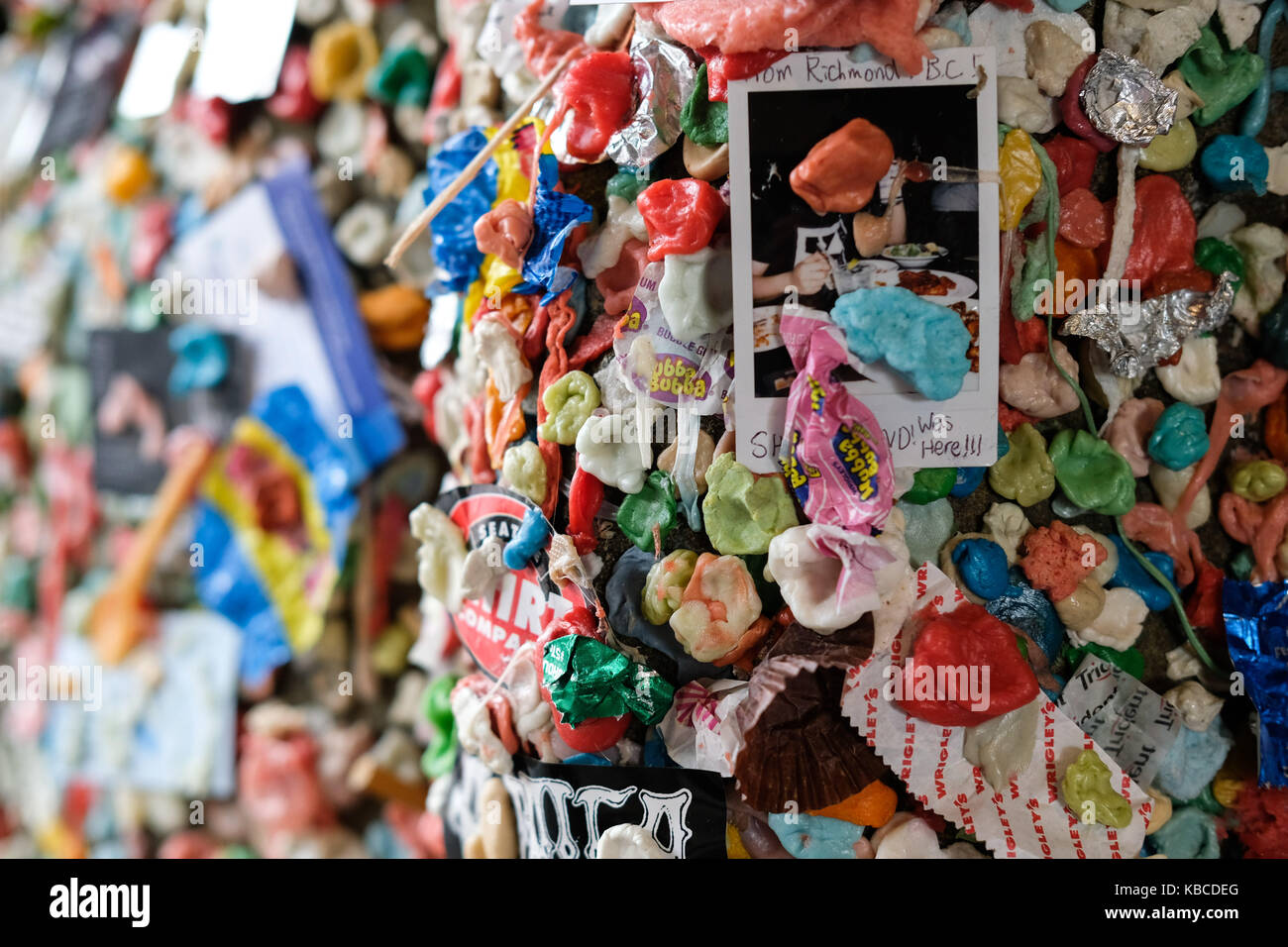 The Gum Wall, a brick wall covered in used chewing gum, in an alleyway ...