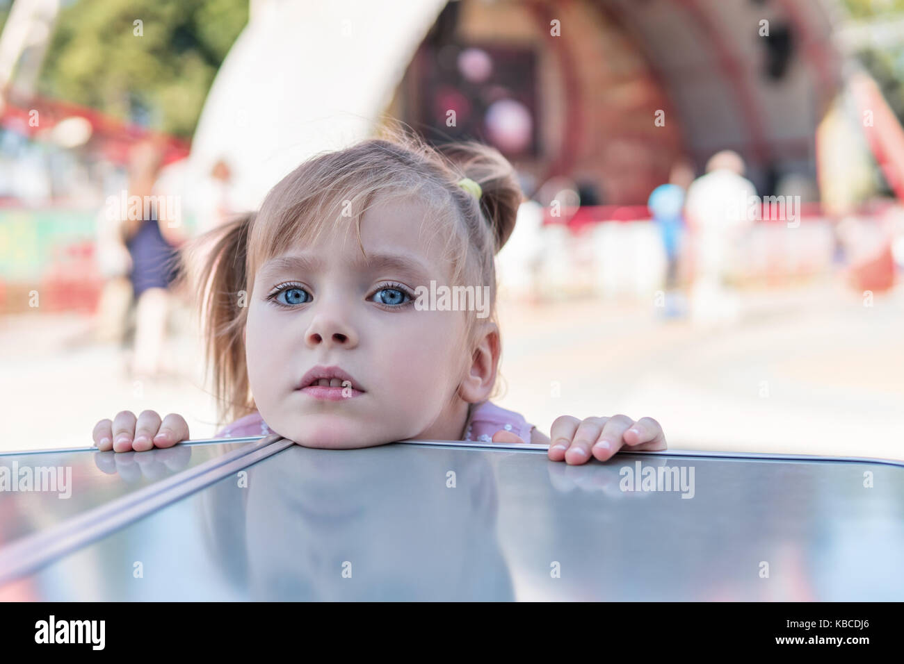 Child head looking out of the table Stock Photo - Alamy