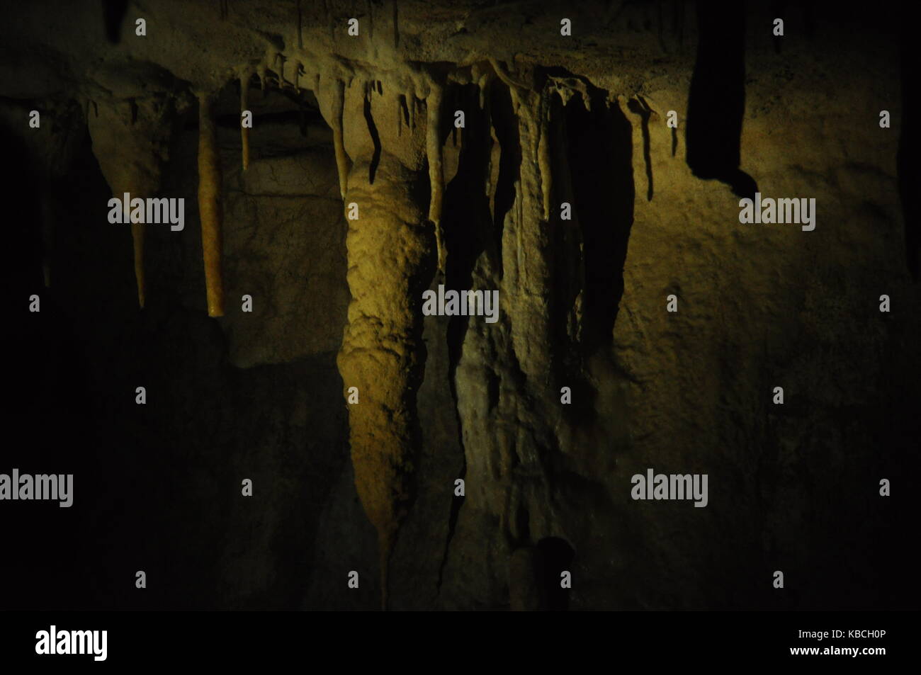 Prometheus Cave. Georgia. Stalactites and stalagmites highlighted ...