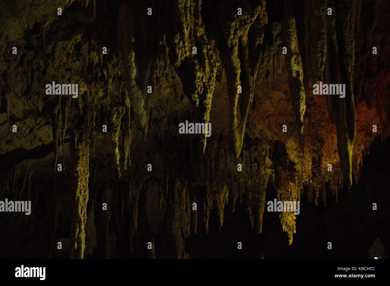Prometheus Cave. Georgia. Stalactites and stalagmites highlighted ...