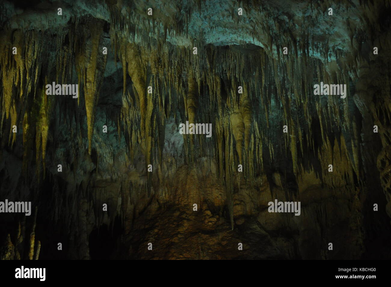 Prometheus Cave. Georgia. Stalactites and stalagmites highlighted ...