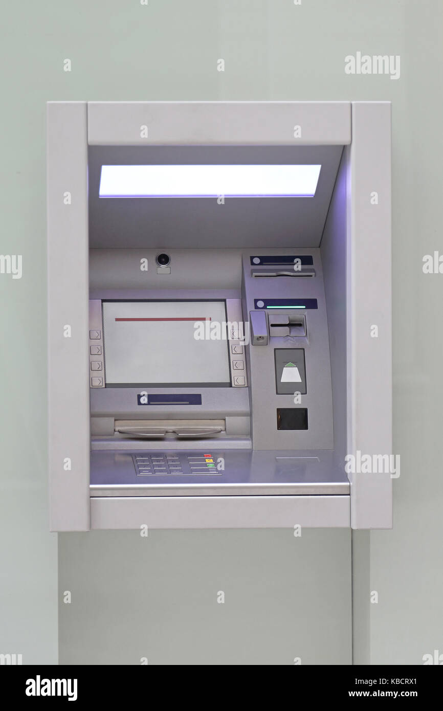 Modern automated teller machine at building exterior Stock Photo - Alamy