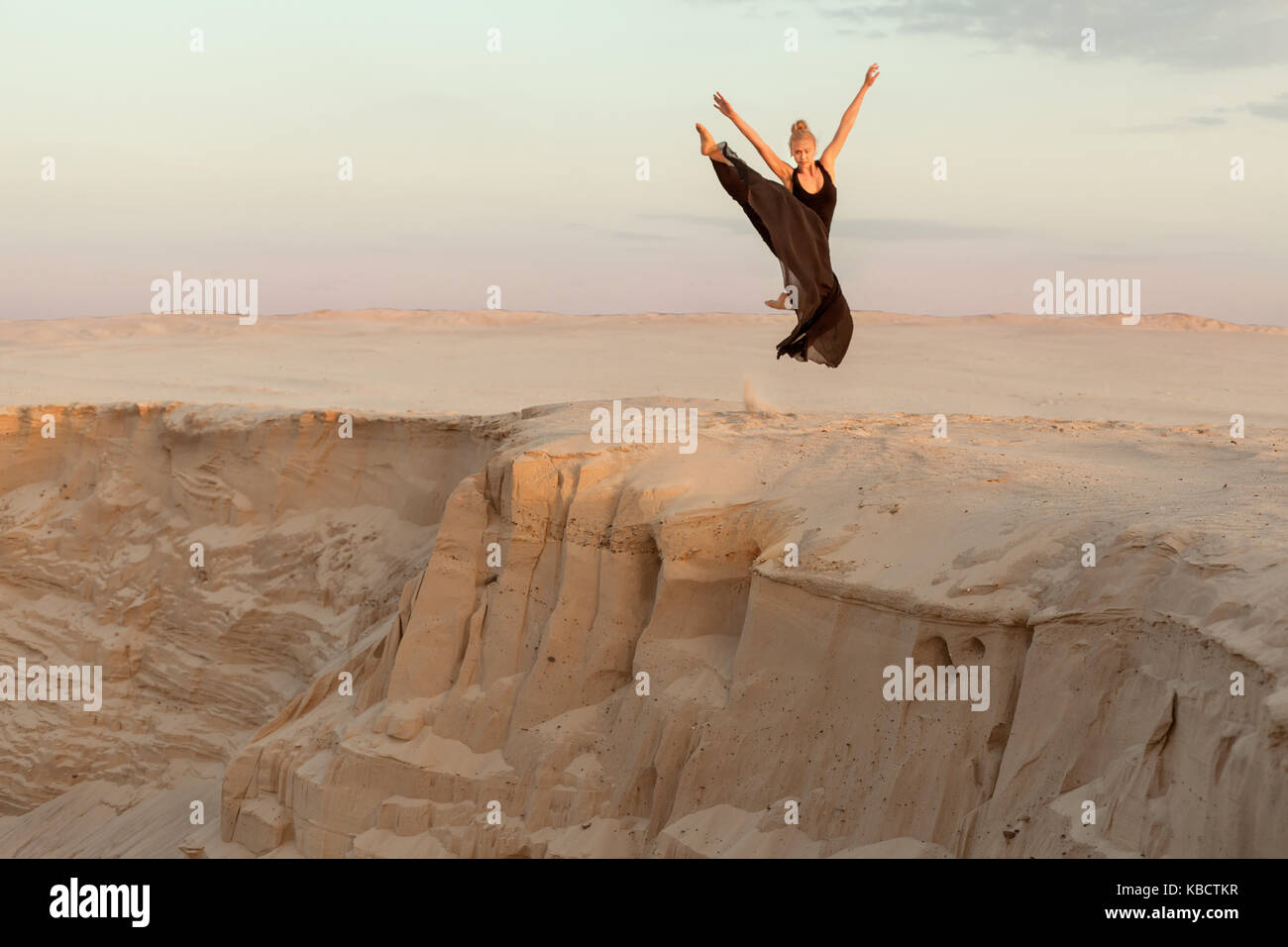 Woman jumped over the abyss in the dance, she shows the performance ...