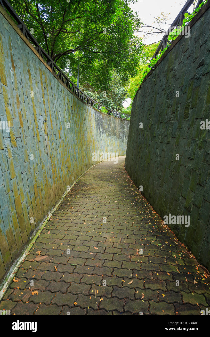 stone walk way underground crossing in tunnel at Fort Canning Park ...