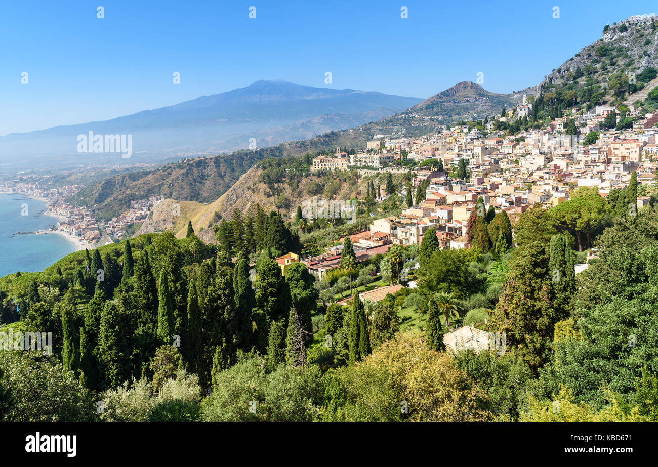 panoramic view of Taormina and etna volcano, sicily, italy Stock Photo ...