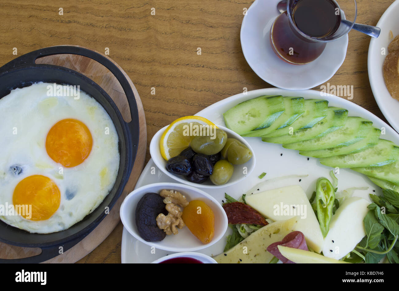 Breakfast plate on wooden table Stock Photo - Alamy