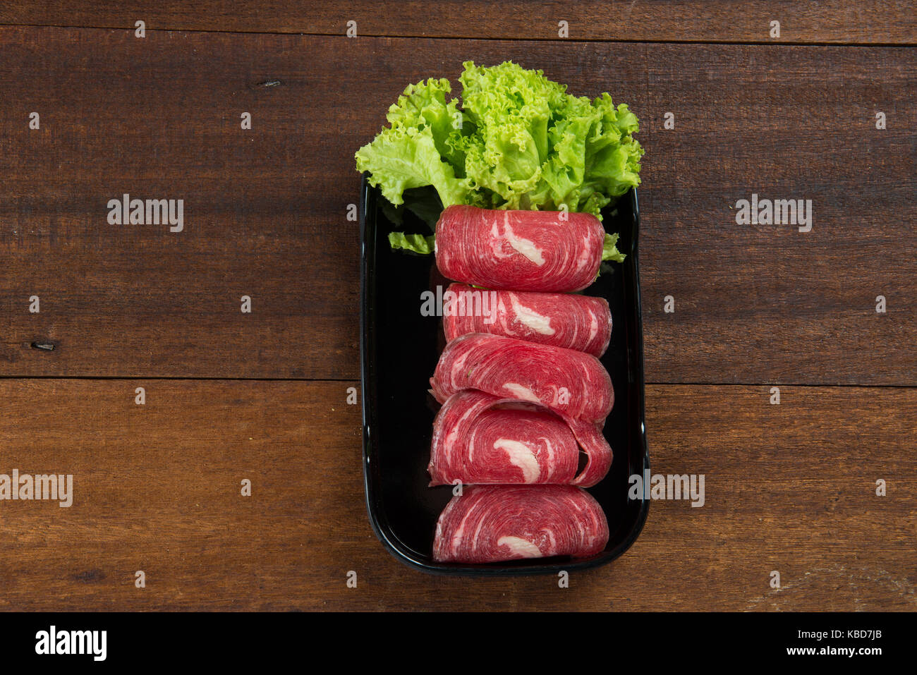 rolled meat for steamboat Stock Photo - Alamy