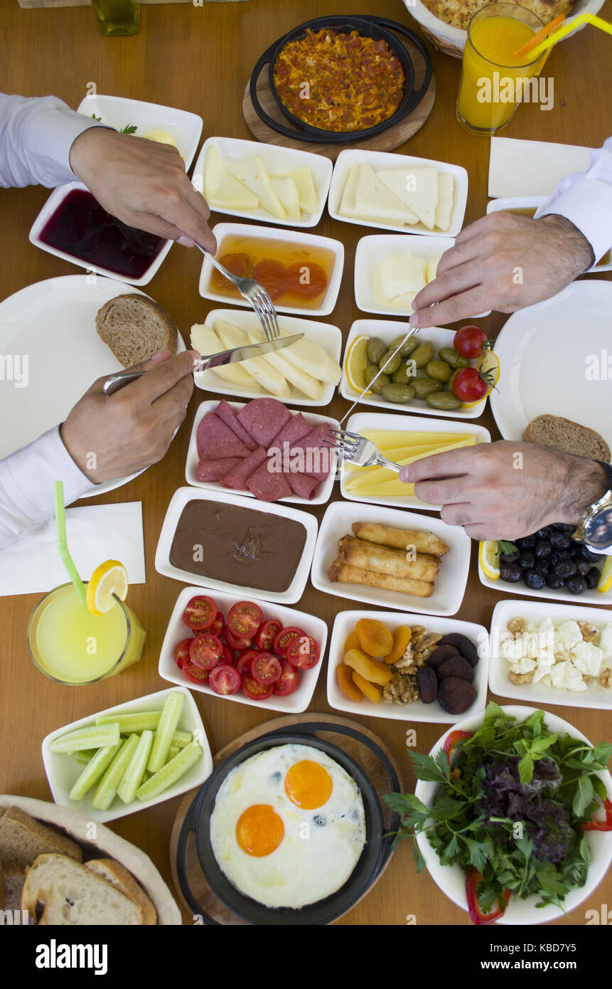 two men at breakfast made with fresh products Stock Photo - Alamy